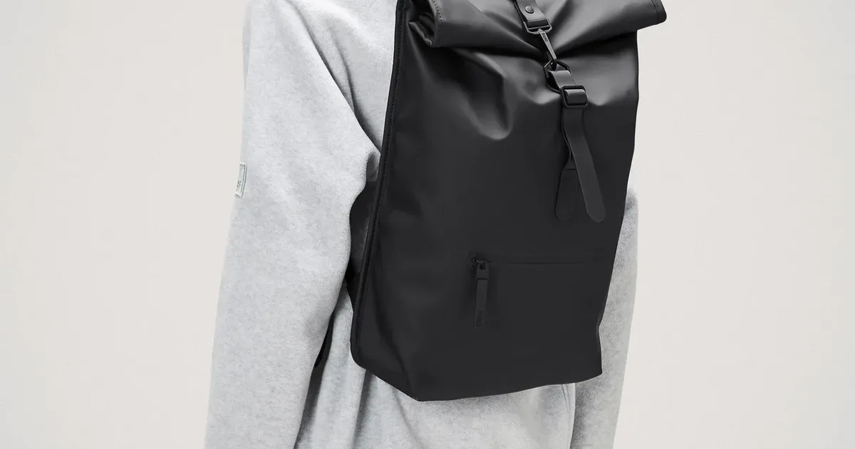 Custom branded Rains outerwear and bags for… | Anthem Branding