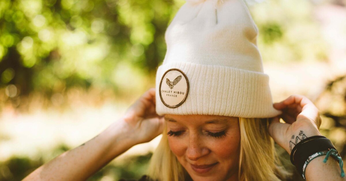 Custom pom beanie Eleven Experience | Anthem Branding